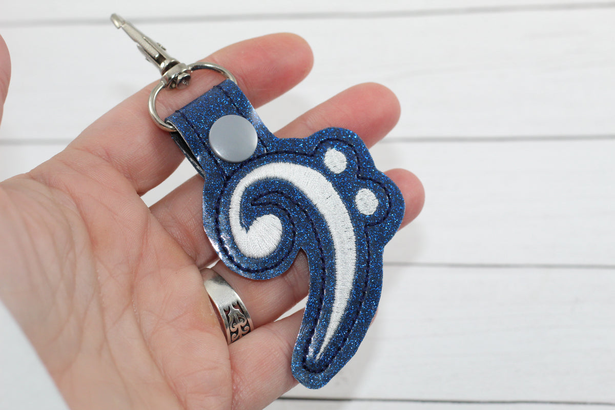 Bass Clef snap tab In The Hoop embroidery design – Designs By Babymoon